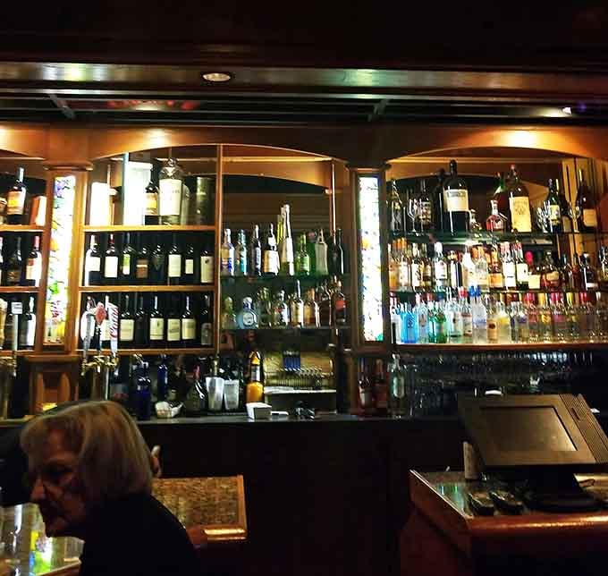 A well-stocked bar ready to pour whatever you need to accompany your massive steak dinner.