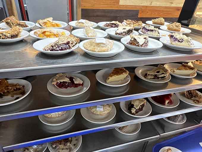 Rows of fresh pies waiting like edible artwork remind you that dessert isn't optional, it's essential research.