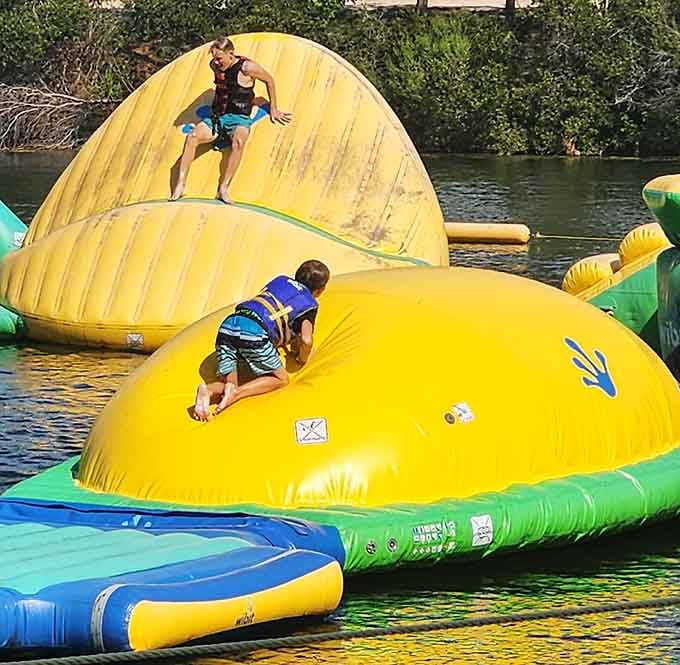 Yellow domes bob on the water like giant beach balls daring you to climb them without falling.