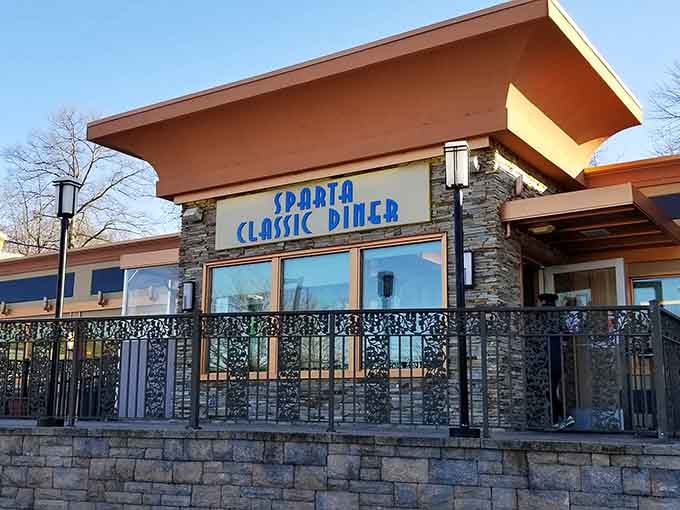 The exterior's contemporary design with stone accents elevates the traditional diner aesthetic to something truly special.