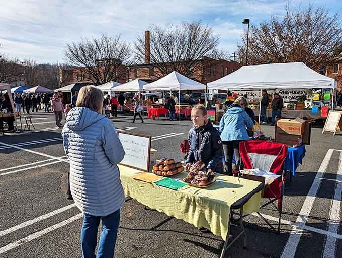 The farmers market buzzes with the energy of people who still believe in talking to strangers about vegetables.