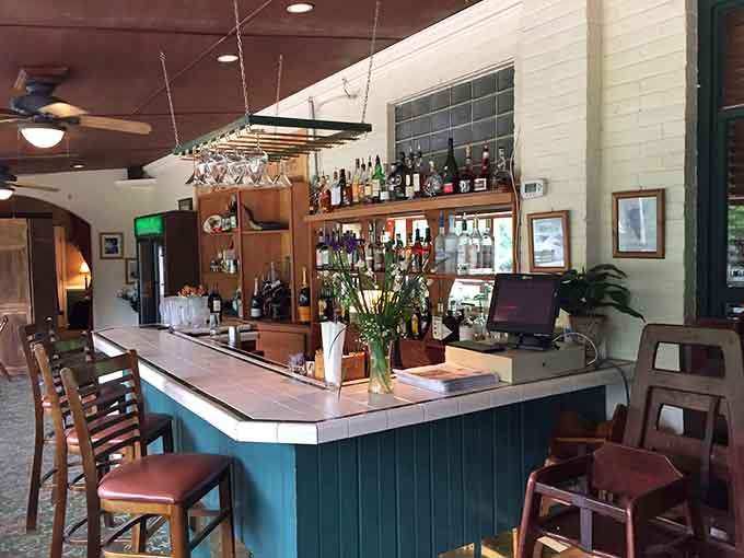 A proper bar stocked with everything needed to craft cocktails that complement rather than compete with exceptional food.