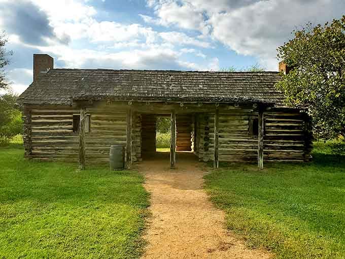 This replica log cabin shows how early settlers lived, making your own camping complaints seem suddenly very petty.