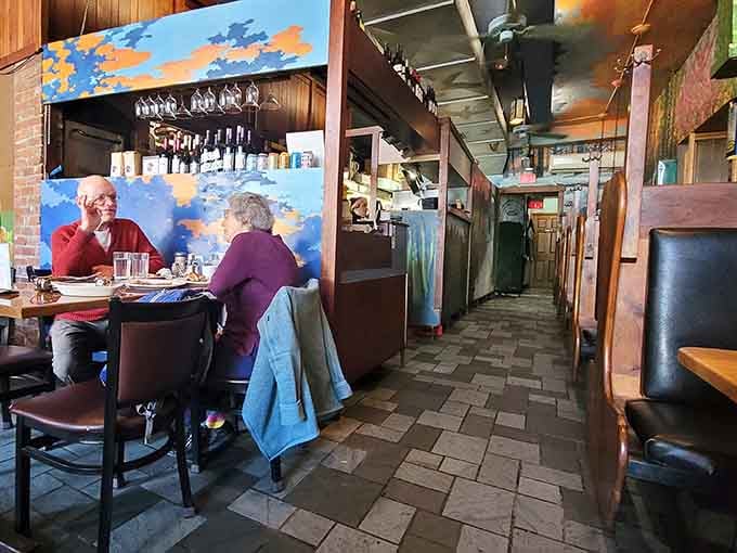 Local diners enjoying conversation over breakfast, the kind of community gathering spot every town needs and treasures.