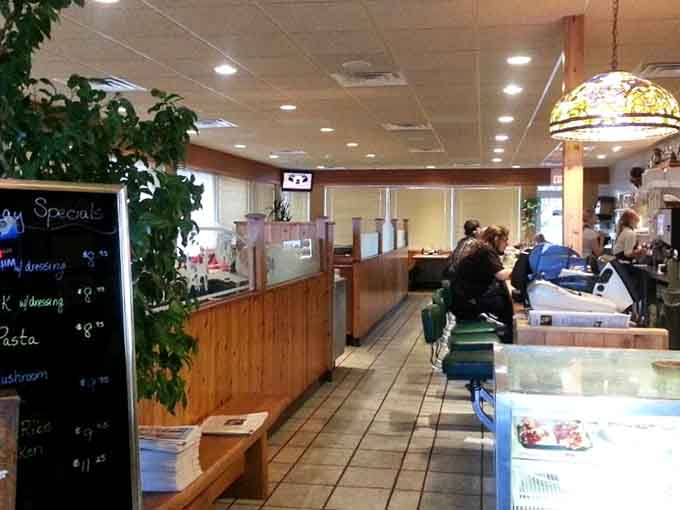 The counter area bustling with activity, where orders get called and coffee flows like a caffeinated river of happiness.