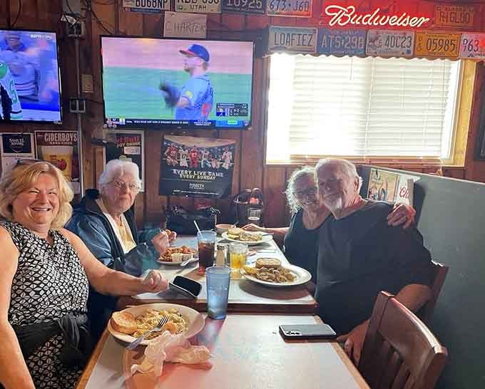 Nothing beats sharing great food with friends while the game plays overhead in comfortable surroundings.