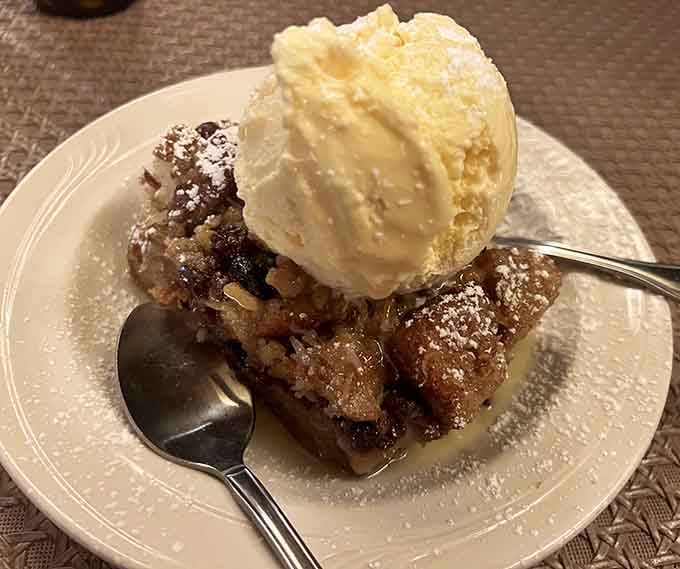 Bread pudding topped with ice cream is how you end a meal like a absolute champion.