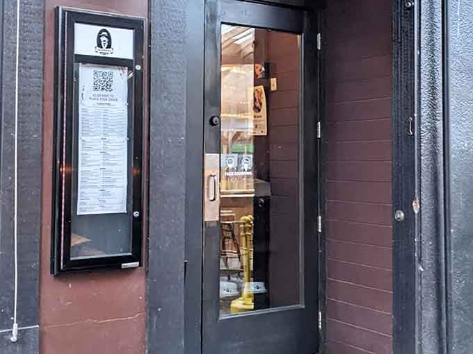 The entrance whispers "come in" while the menu inside screams "you're going to need help finishing this."