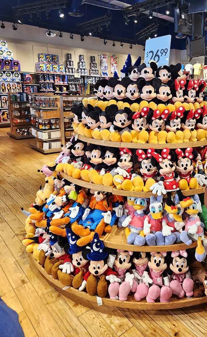 Mickey and friends stacked high like a Disney-approved pyramid scheme, bringing childhood magic home at outlet prices.