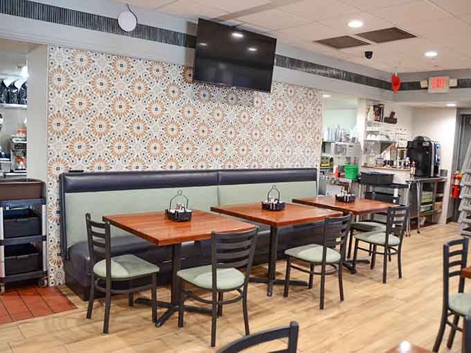 A decorative tile wall adds just enough personality without trying too hard to impress anyone here.