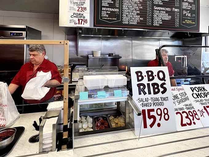 The hardworking crew behind the counter keeps everything running smoothly, from order to plate with impressive speed.