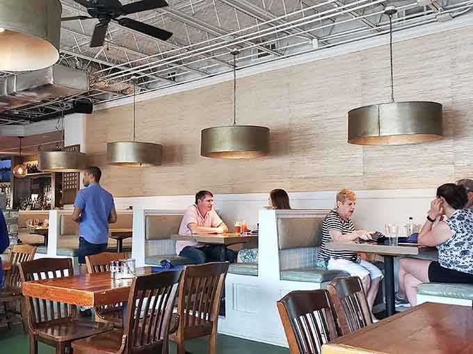 Real diners enjoying real meals, because the best restaurant photos are the ones showing actual happy customers eating.