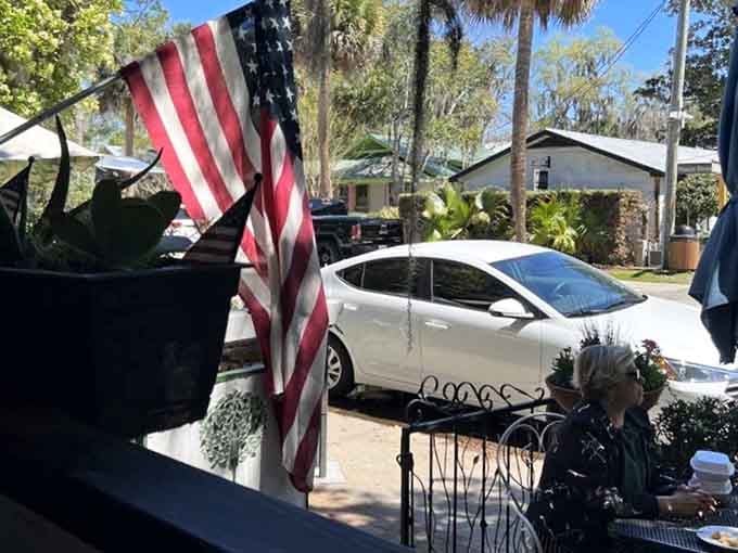 Street parking and palm trees together create that perfect Lowcountry vibe where everything moves just a little bit slower.