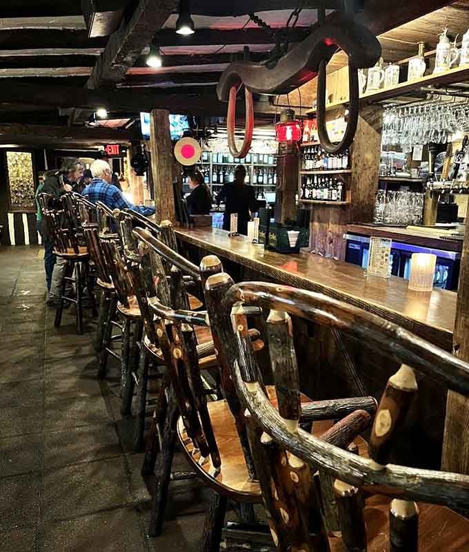 The bar beckons with rustic stools and enough character to make you want to settle in indefinitely.