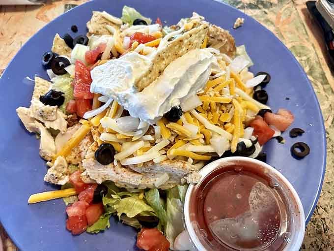 Taco salad piled with chicken, cheese, and all the toppings turns healthy eating into something you'd actually order twice.