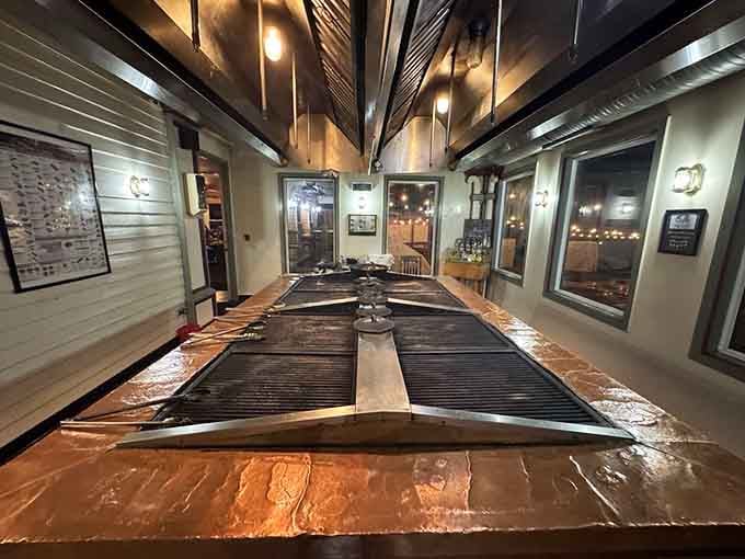 The grill room offers a behind-the-scenes peek at where the magic happens, flames and all.