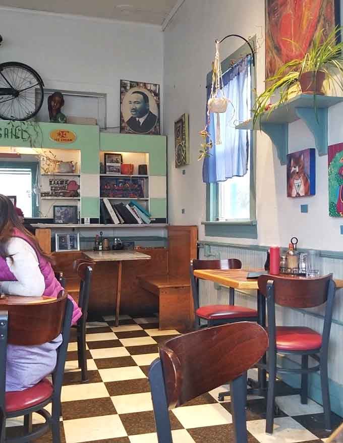 High ceilings, colorful art, and that perfect breakfast restaurant energy that makes you want to linger indefinitely.