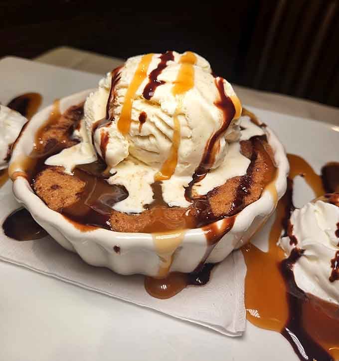 Dessert drizzled with caramel and chocolate sauce, because sometimes you need to end your meal with pure, unapologetic sweetness and joy.
