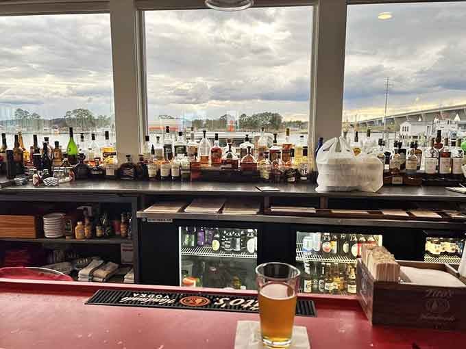 The well-stocked bar with waterfront views through every window means your cocktail comes with complimentary scenery that never disappoints.