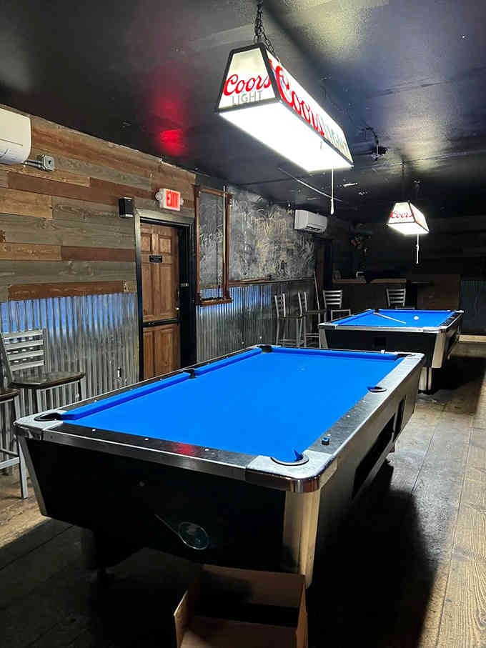 Head upstairs to the pool room where you can rack 'em up in a space that's delightfully dark.
