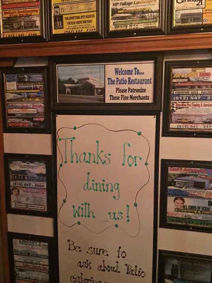 Local business cards and heartfelt thank-you notes on the wall show this restaurant's deep roots in the community.