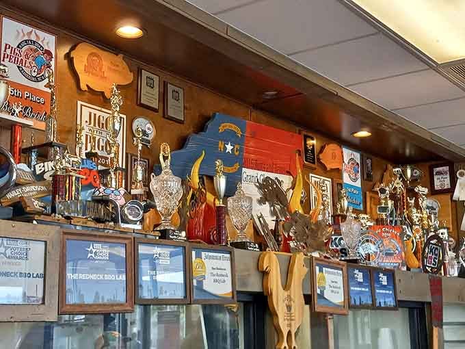 That trophy shelf looks like it could collapse under the weight of victory any minute now, gloriously so.