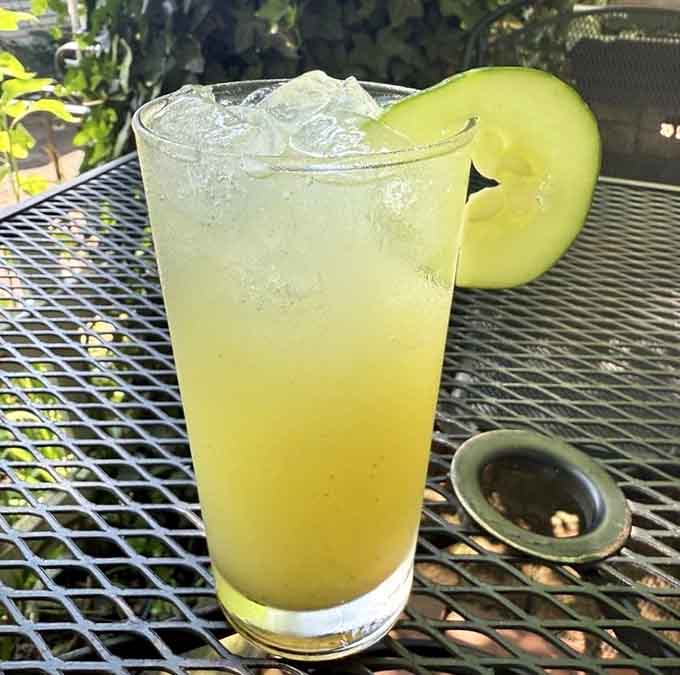 Cucumber Mint Lemonade garnished with fresh apple offers refreshment that tastes like summer itself.