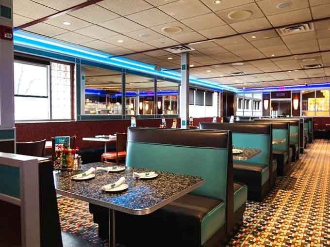 Spacious booths in teal and brown create the perfect setting for lingering over coffee and conversation.