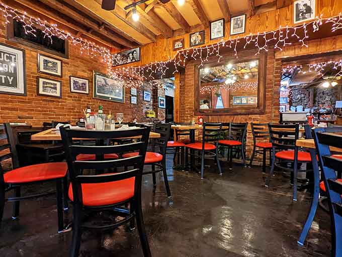 Red-cushioned chairs and wooden tables fill a dining room where history and hospitality meet for every meal.