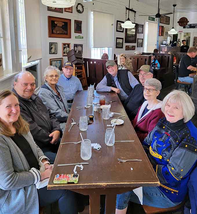 Families gathering around long tables, sharing meals and making memories in true Southern fashion.