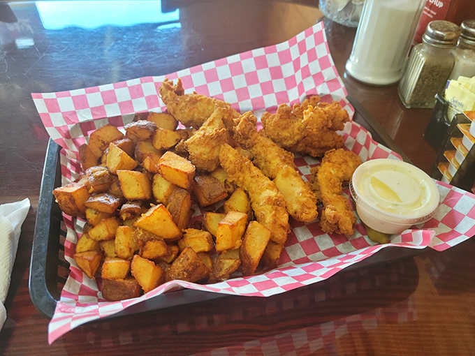 Crispy chicken strips with seasoned home fries prove that comfort food doesn't need to be complicated to be perfect.