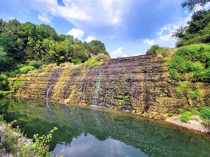 The exposed limestone wall tells geological stories spanning eons, making our daily worries seem refreshingly insignificant by comparison.