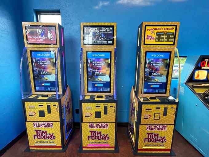 Action card kiosks stand ready to load up your adventure credentials, the modern gateway to unlimited indoor entertainment possibilities.