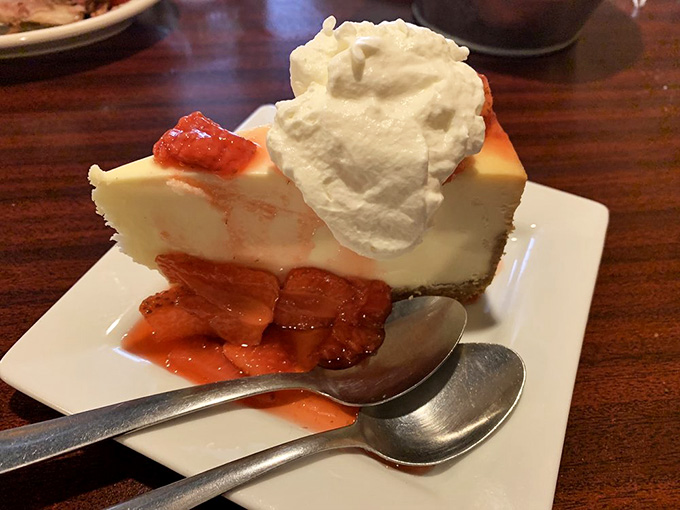 Creamy cheesecake topped with strawberries and whipped cream provides the sweet ending your prime rib dinner deserves perfectly.