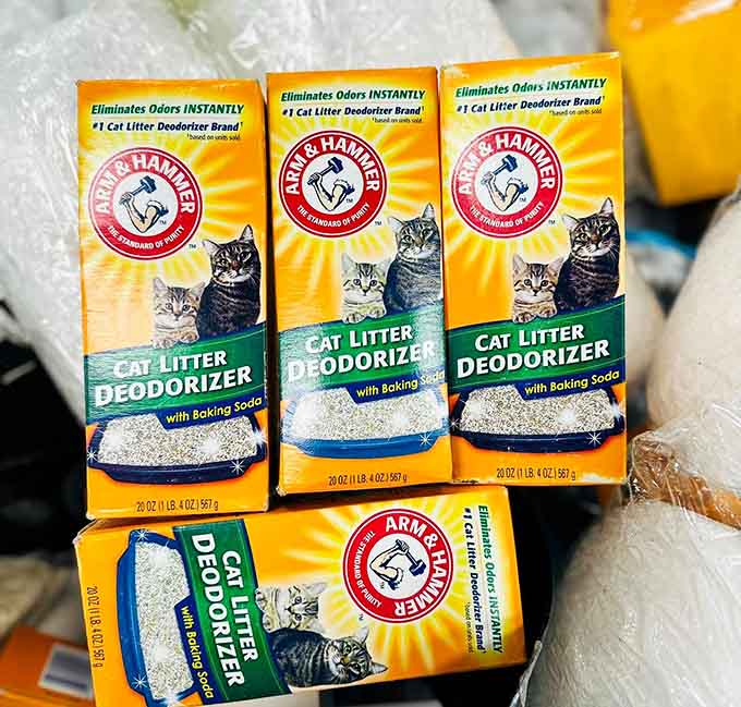 Arm & Hammer products lined up like soldiers, ready to tackle litter box duty at bargain prices.