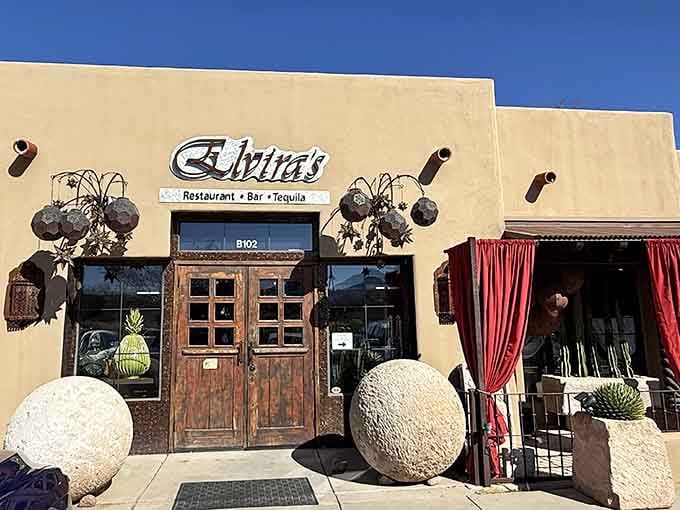 Wooden doors flanked by spherical planters invite you into authentic Mexican flavors locals have loved for decades.