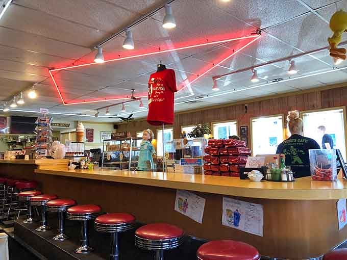 The counter stretches invitingly with those perfect spinning stools just waiting for someone to claim their favorite spot.