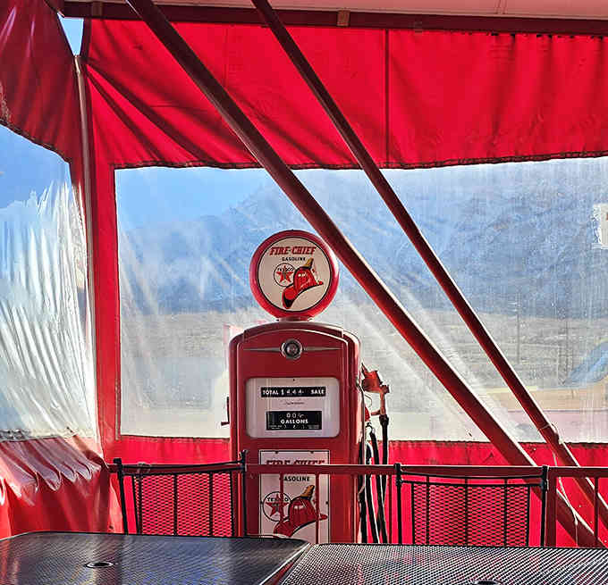 Classic Americana decor featuring a vintage Fire Chief gas pump that's more photogenic than most Instagram influencers.