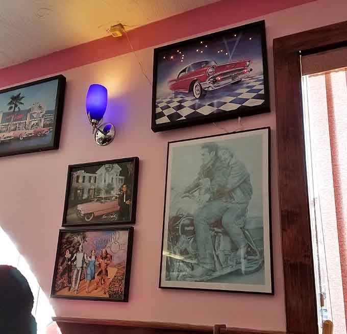 Classic cars and vintage scenes adorning pink walls, transporting you straight back to simpler, more chrome-filled times.