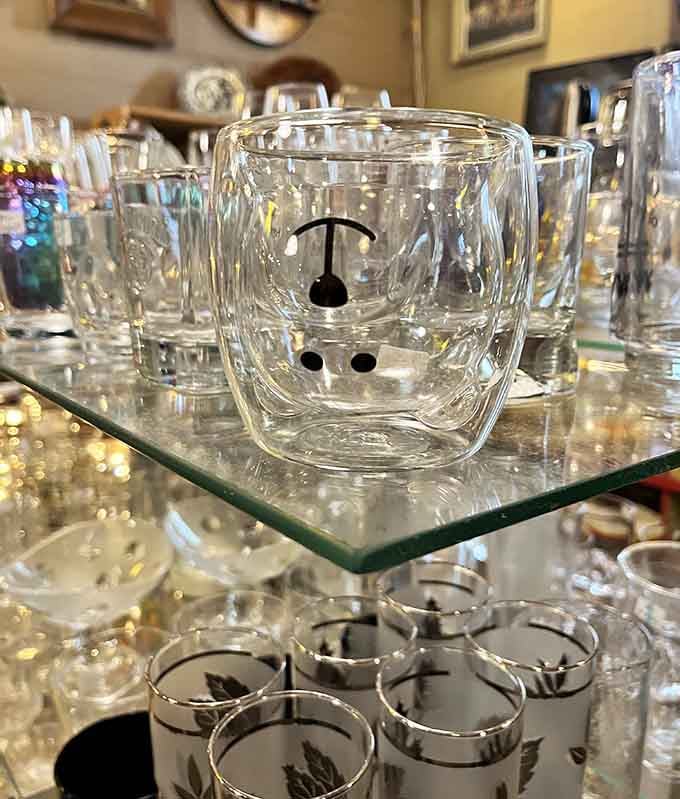 Even the glassware has personality here, including this adorable double-walled cup with a cheerful little face.