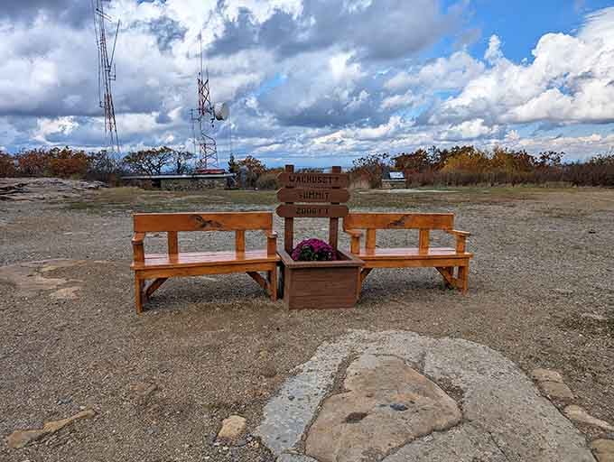 Summit benches offer front-row seats to nature's theater, where clouds perform daily shows across endless Massachusetts horizons.
