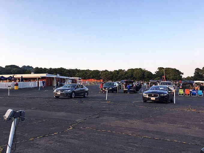 Cars gather like old friends reuniting, ready to share another unforgettable evening watching movies outdoors.