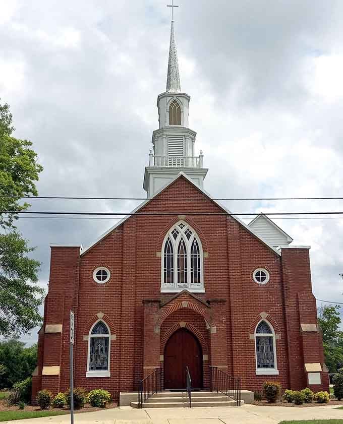 Gothic windows and soaring steeple create architectural poetry in brick, where faith and fellowship have mingled for lifetimes.
