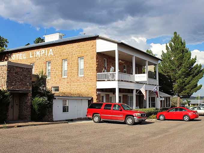 Hotel Limpia's two-story gallery and golden stone walls stand ready to welcome guests just like they have for over a century.