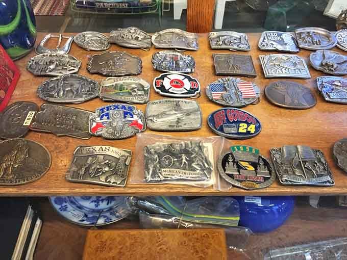 Belt buckles telling stories of rodeos, patriotism, and personal style from eras when accessories actually meant something special.