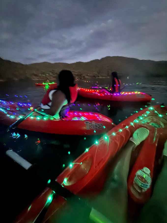 LED-lit kayaks creating a floating light show: because regular kayaking apparently wasn't Instagram-worthy enough for modern times.