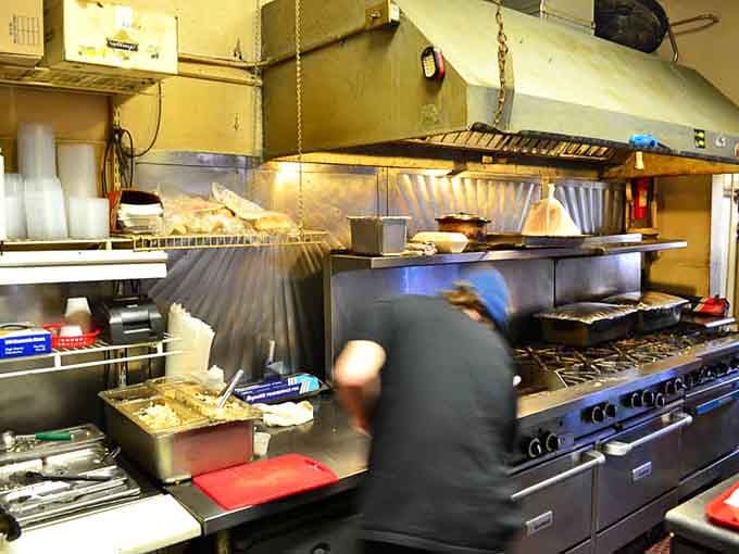Behind the scenes where the magic happens, one rack of ribs at a time, every single day.