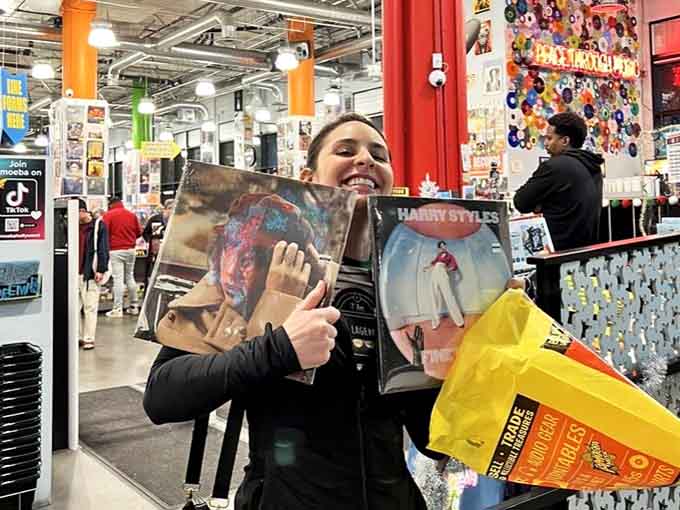 That smile says she's found exactly what she didn't know she was looking for today.