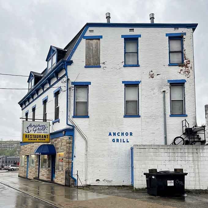 The weathered exterior tells stories of decades serving Covington, each scratch representing countless satisfied breakfast customers walking through.