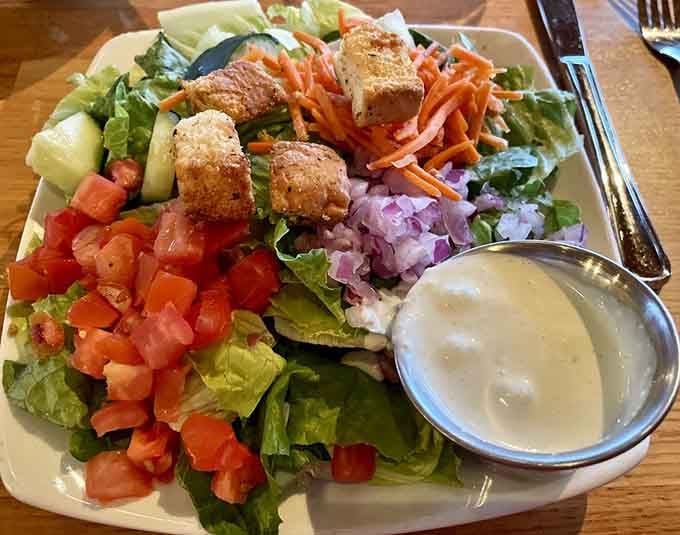 This colorful salad loaded with fresh vegetables and fried goat cheese makes eating healthy feel like an actual treat.